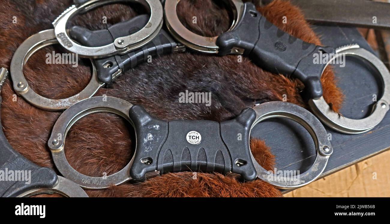 Police and BDSM TCH handcuffs and restraint equipment Stock Photo - Alamy