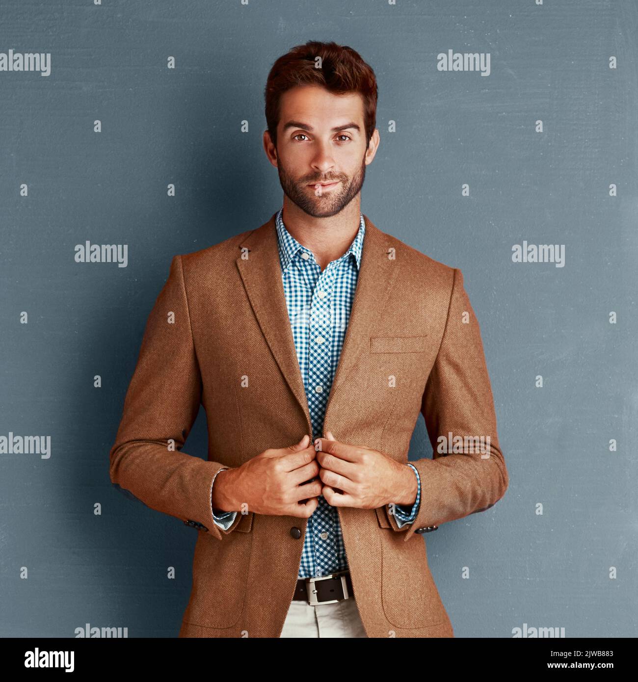 No outfit is complete without confidence. Studio portrait of a ...