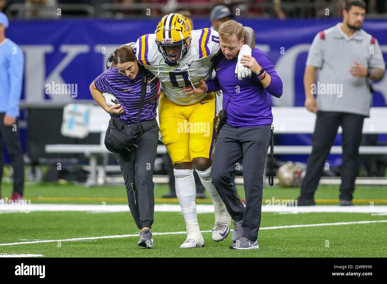 New Orleans, USA. September 4, 2022: LSU's Maason Smith (0) is helped ...