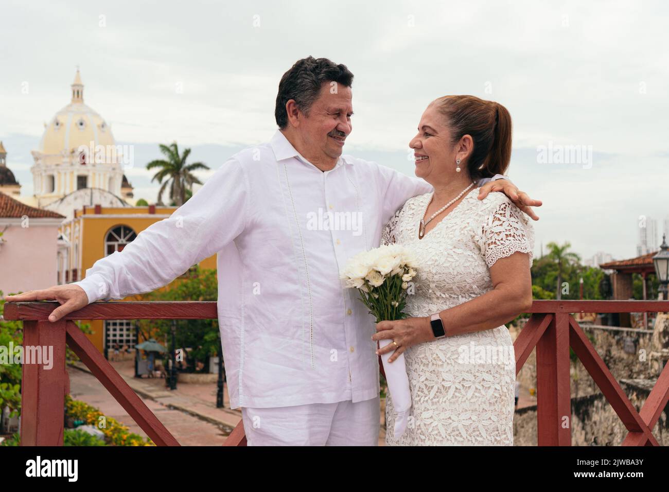 Side view of the bride and groom getting married outdoors Stock Photo ...