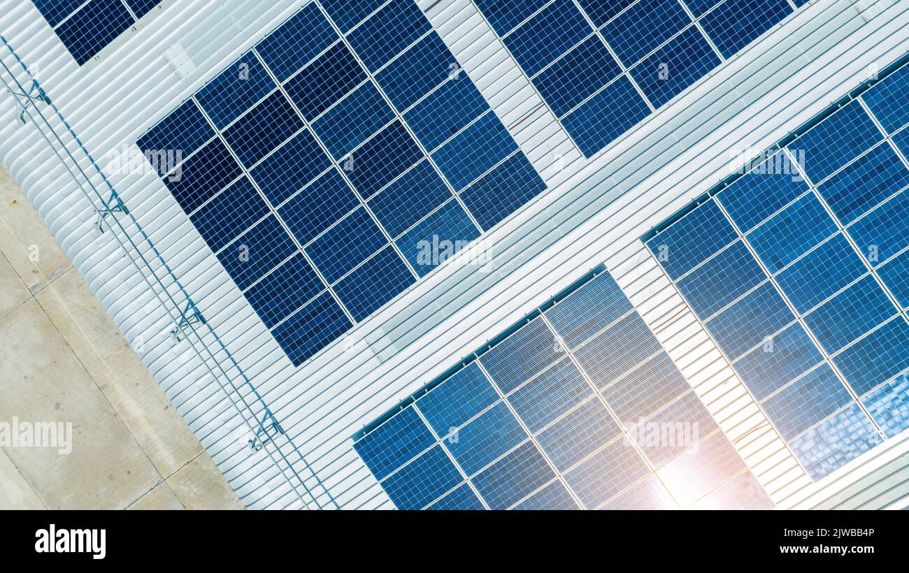 Top view Solar Cell on Warehouse Factory. Solor photo voltaic panels ...