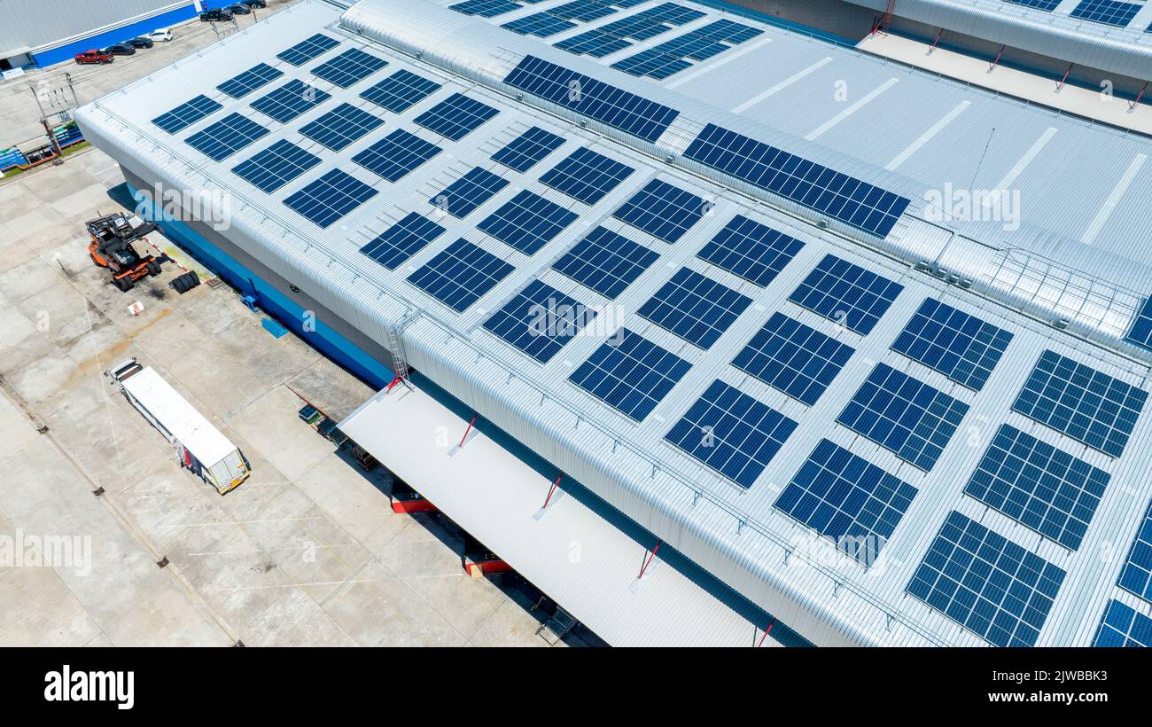 Top view Solar Cell on Warehouse Factory. Solor photo voltaic panels system power or Solar Cell ...
