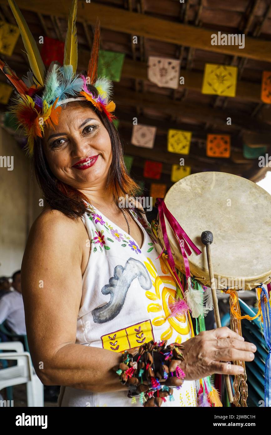 An indigenous woman poses for a photo during the celebration of ...