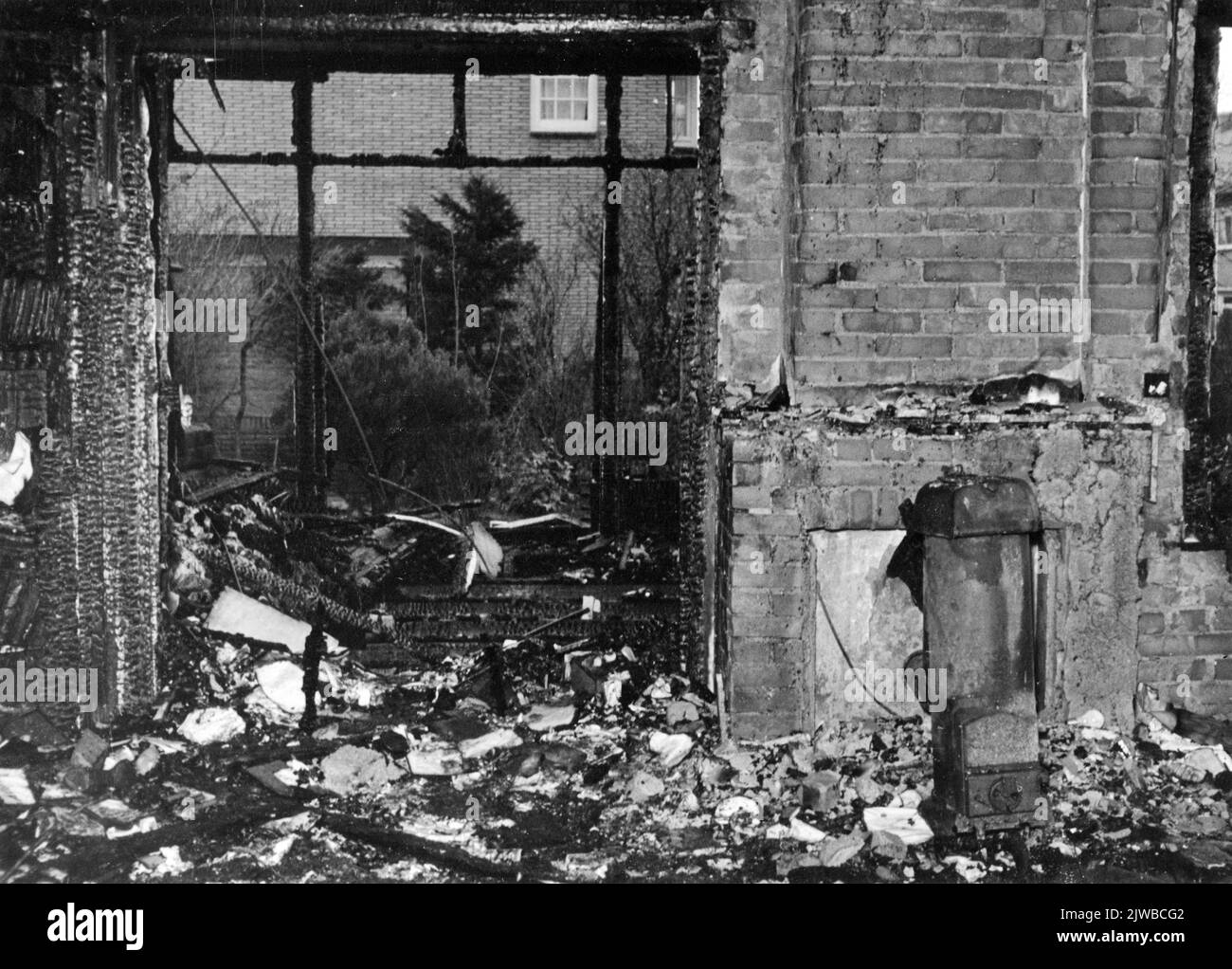 View of the interior of the completely burnt -out corner building prof ...