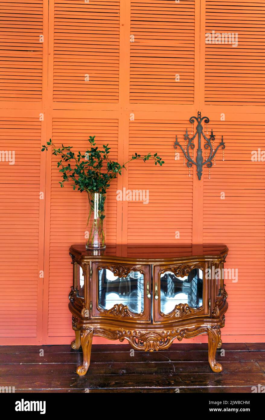 Stylish living room interior design with retro wooden chest of drawers ...