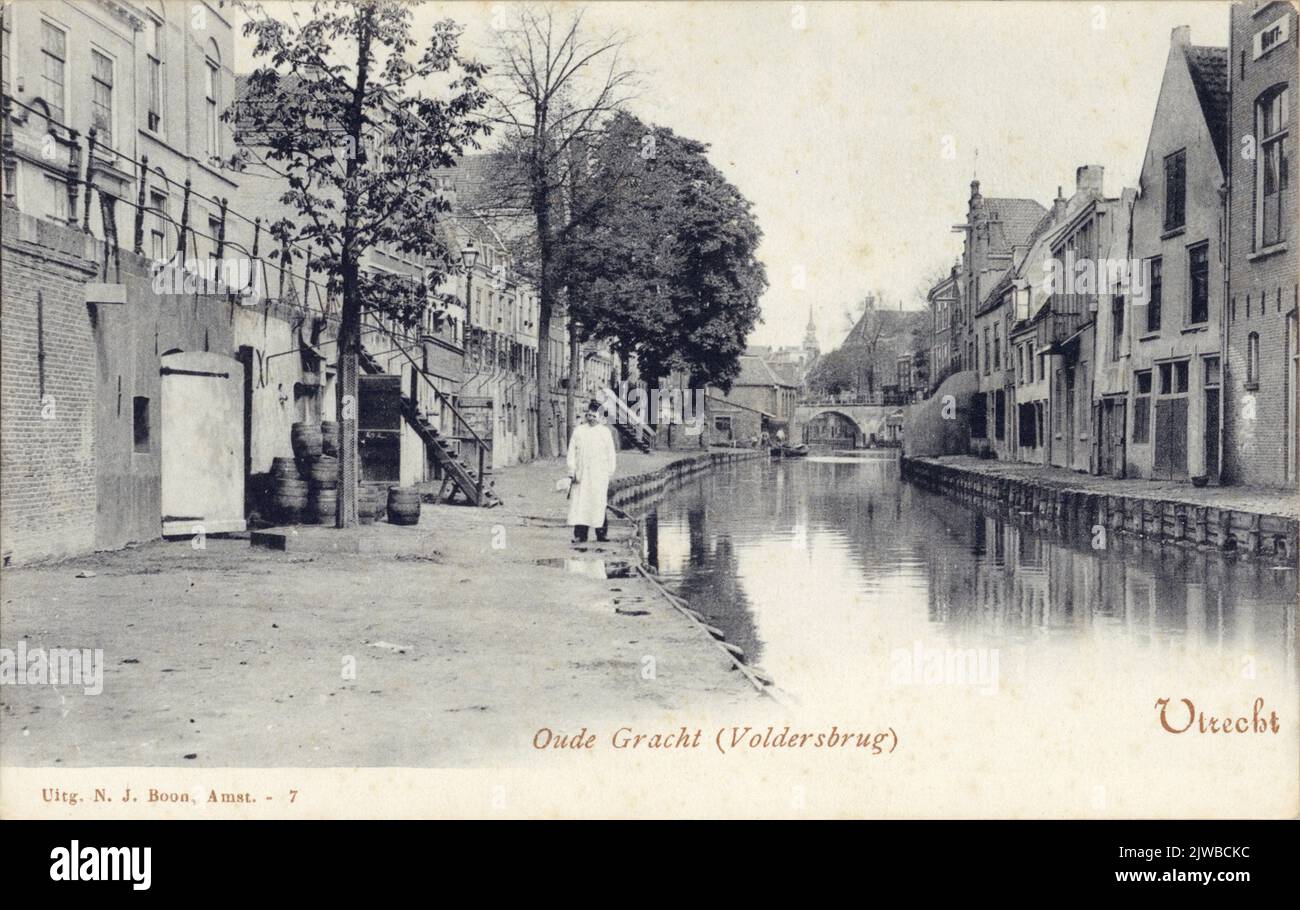 View of the Oudegracht in Utrecht with the yard on Twijnstraat on the ...