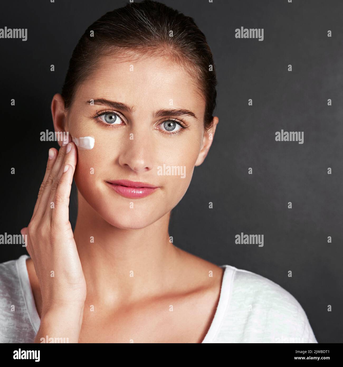 She sticks to her skincare routine. Studio portrait of an attractive ...