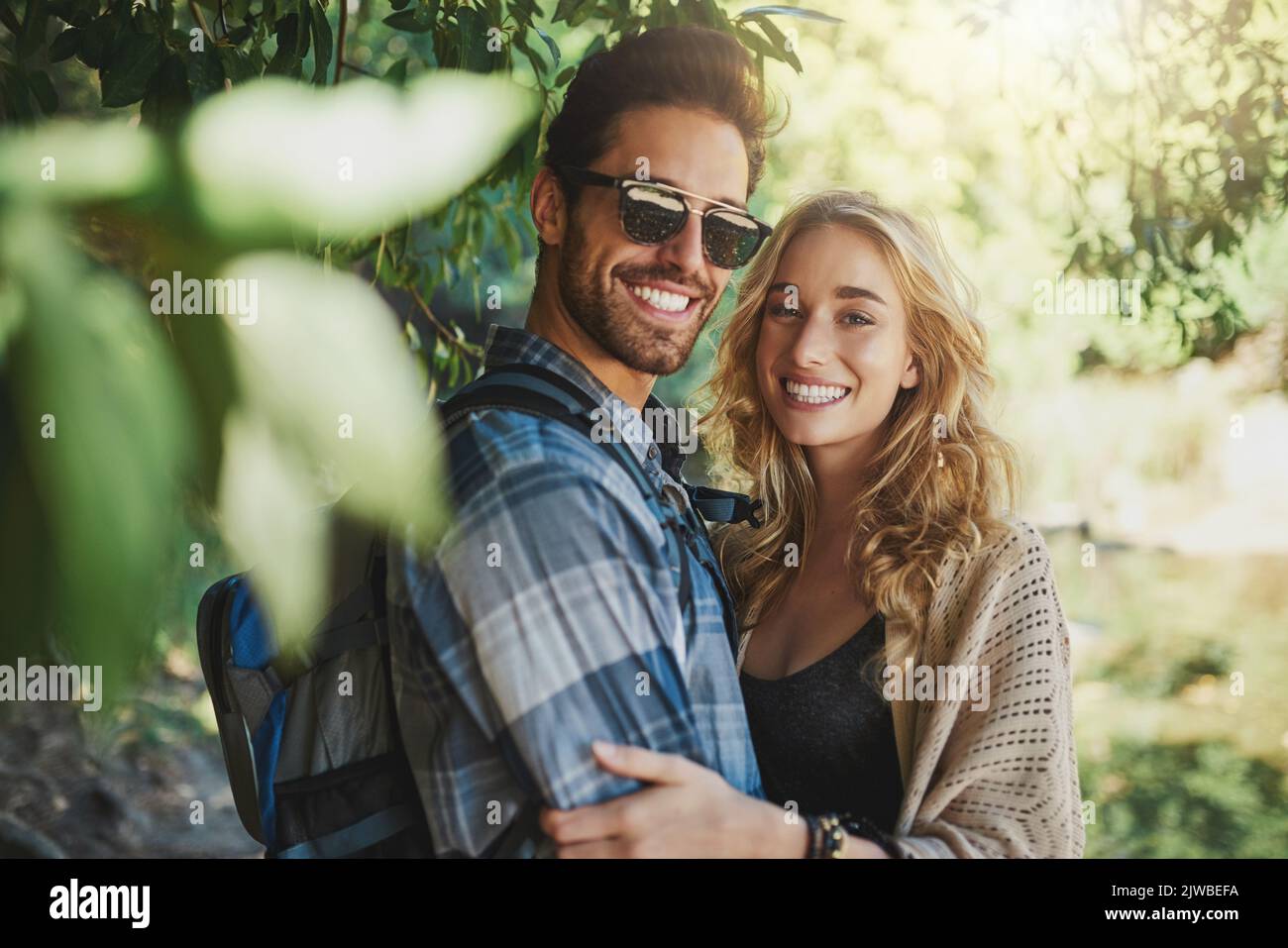 Nothing beats a day in nature together. a happy young couple spending ...