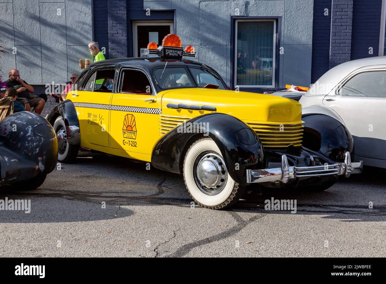The yellow and black 1936 Cord 810 Westchester Sunshine Radio taxi cab ...