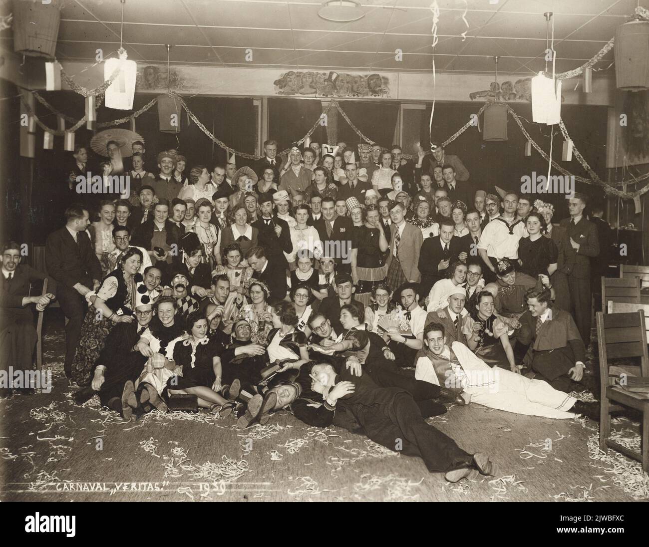 Group portrait of members of the Veritas student association during the ...