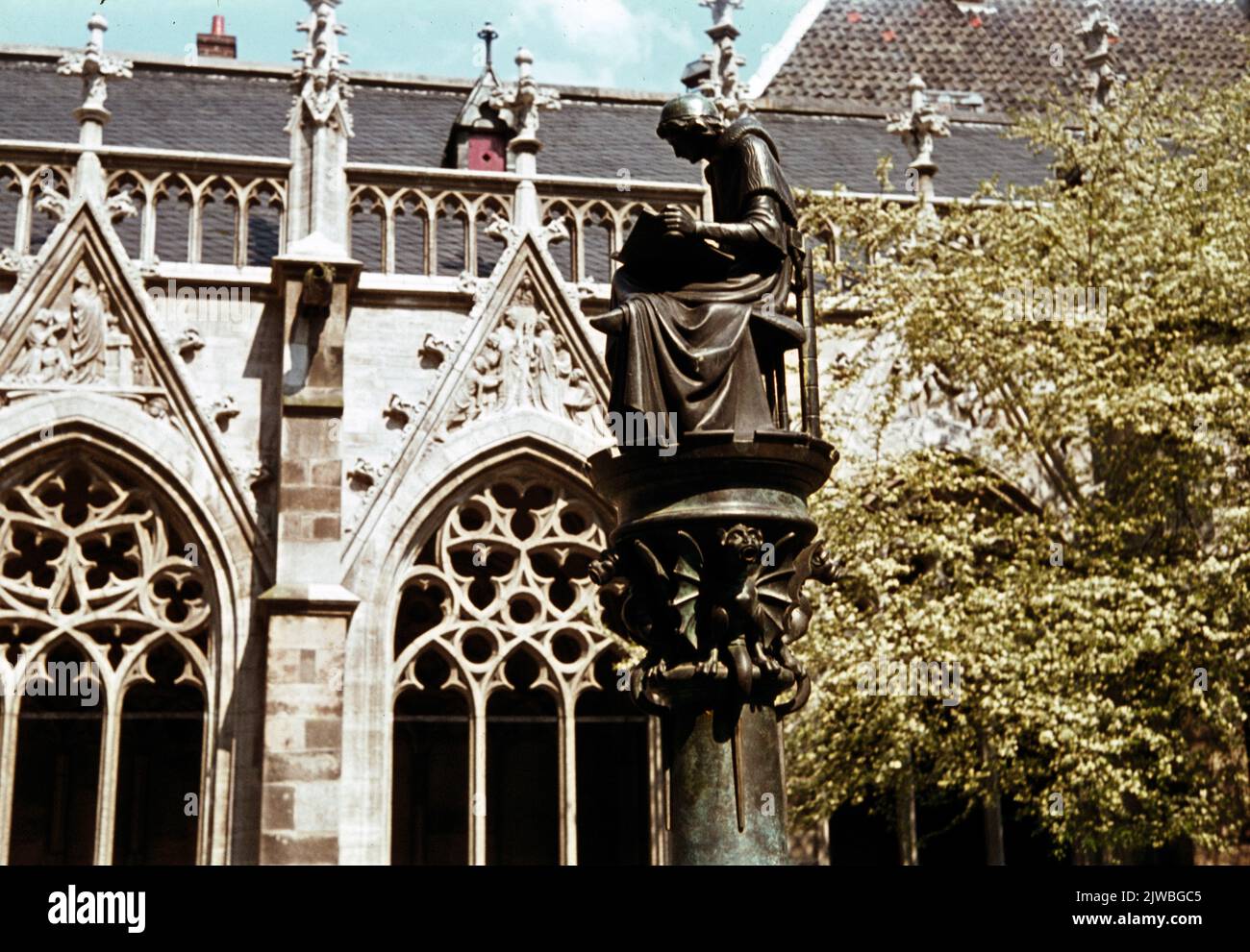 Image of the statue of the writing monk on the fountain in the pandhof ...