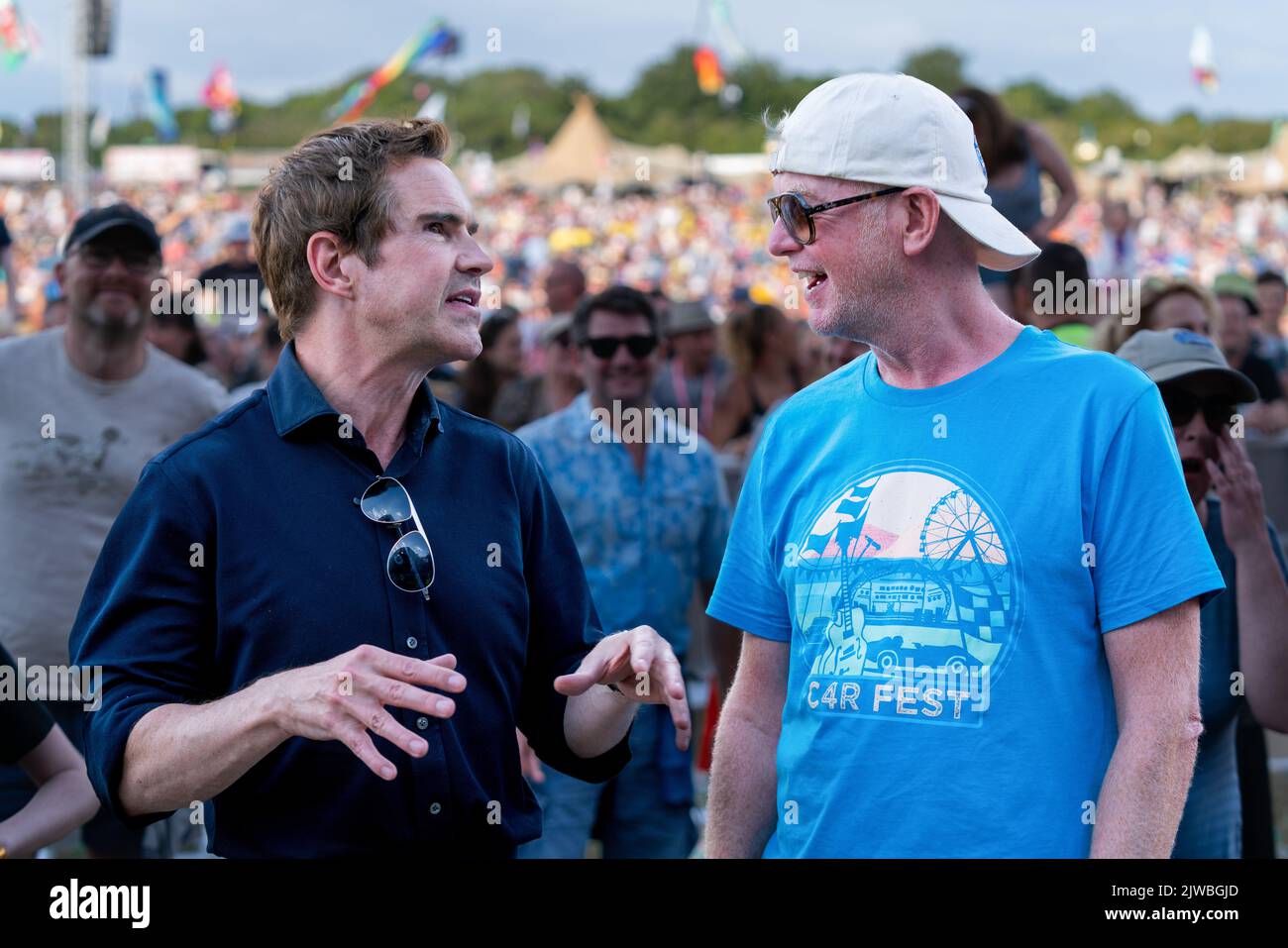 Jimmy Carr (L) and Chris Evans (R) come out to the pit at the front of ...