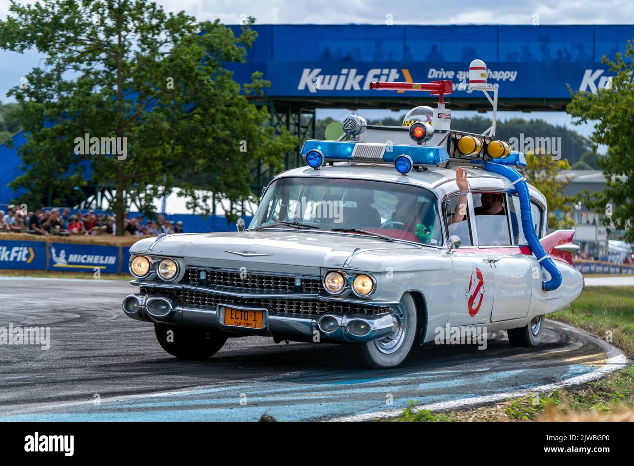 A film car replica from Ghostbusters drives round the Track at the Car ...