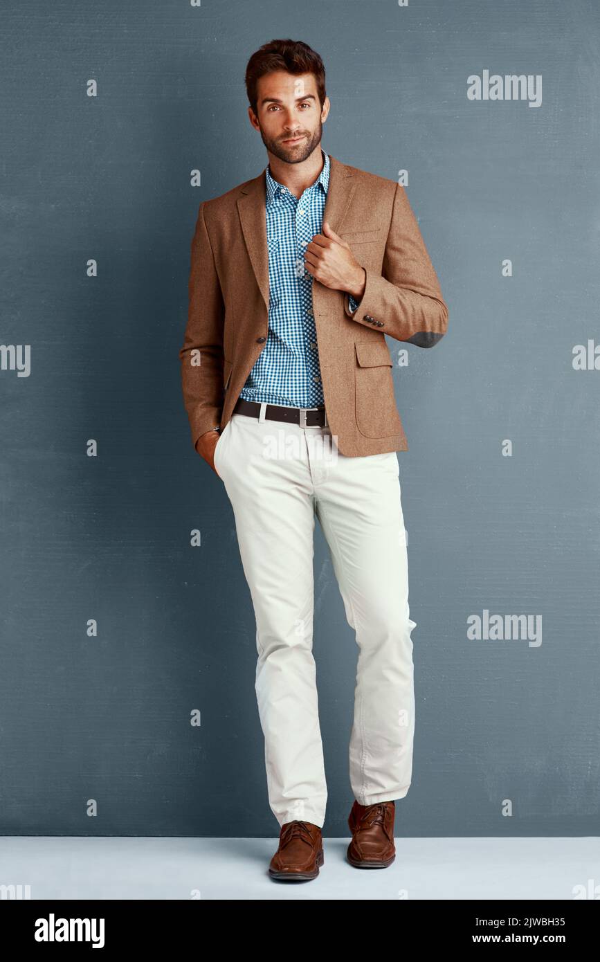 Flaunting his effortless style. Studio portrait of a stylishly dressed ...