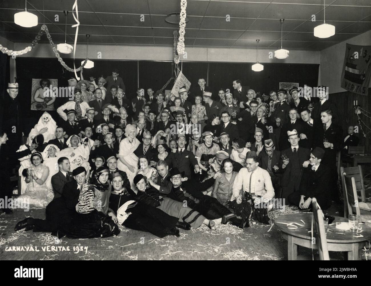 Group portrait of members of the Veritas student association during the ...