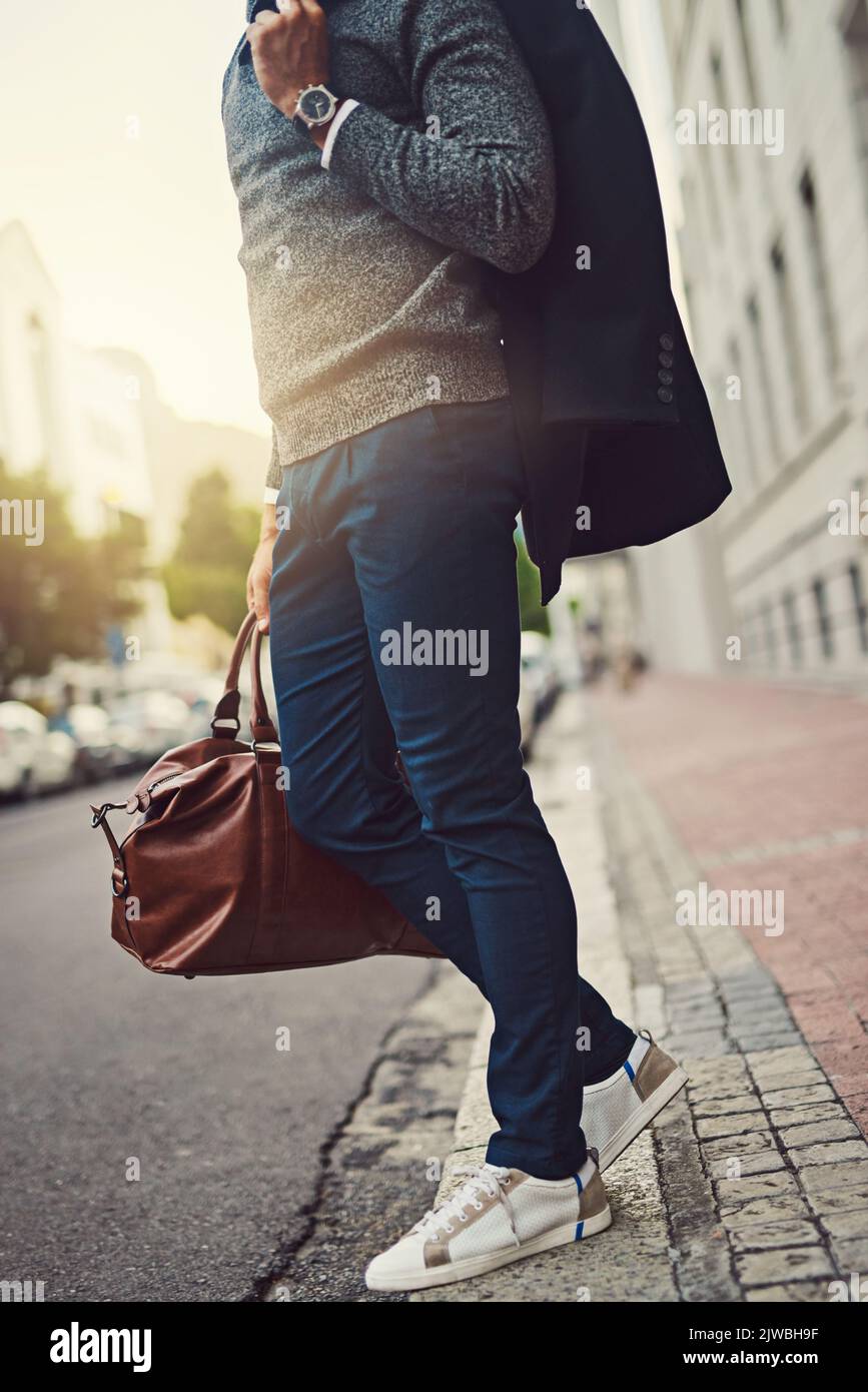 Stepping out in style. a fashionable young man out in the city Stock ...