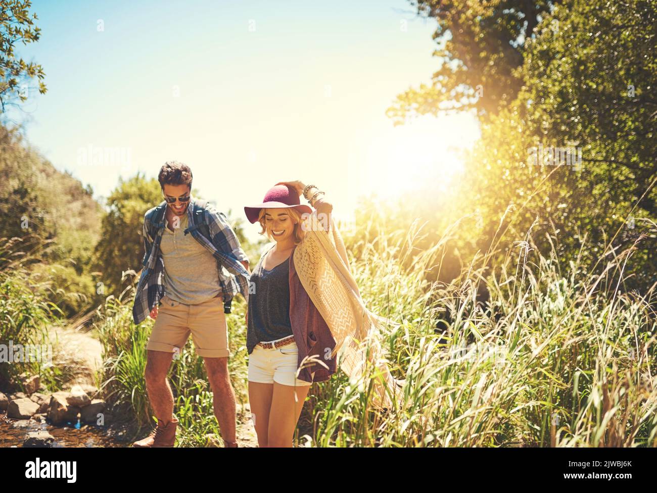 Their favorite place to spend time together is in nature. a happy young ...
