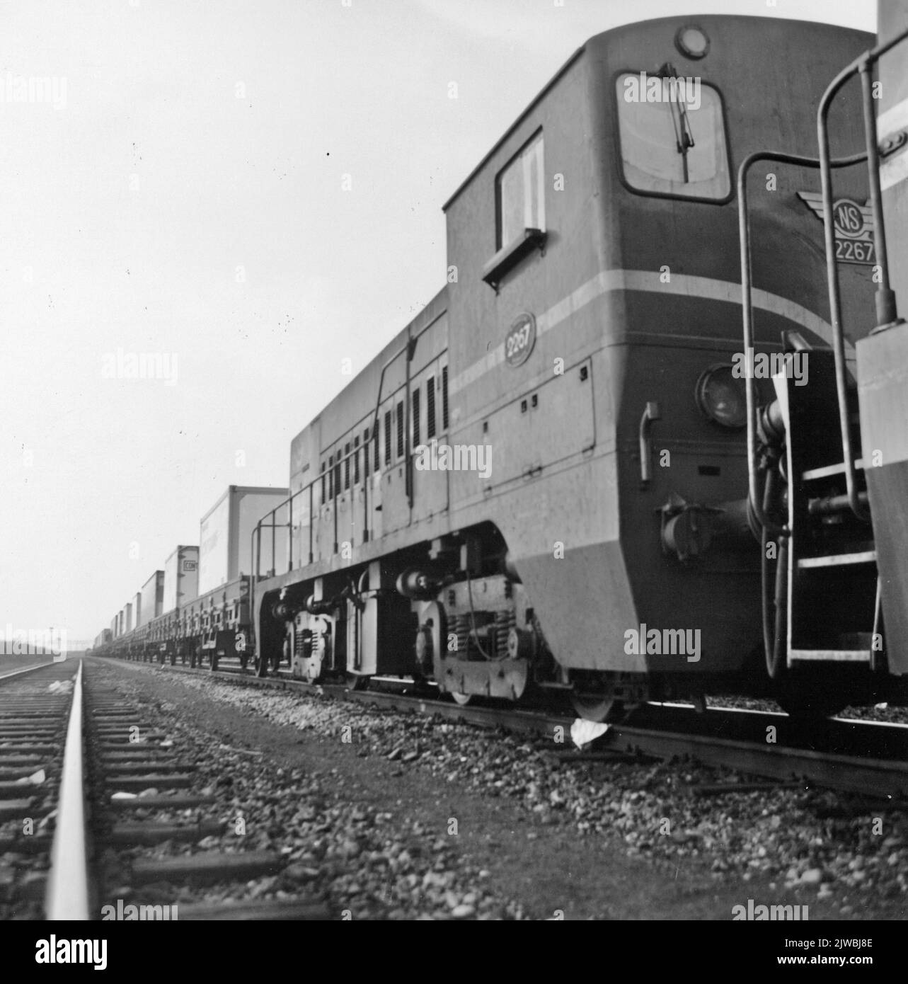 Image of a container train drawn by the diesel-electrical locomotive No. 2267 (series 2200/2300 ...