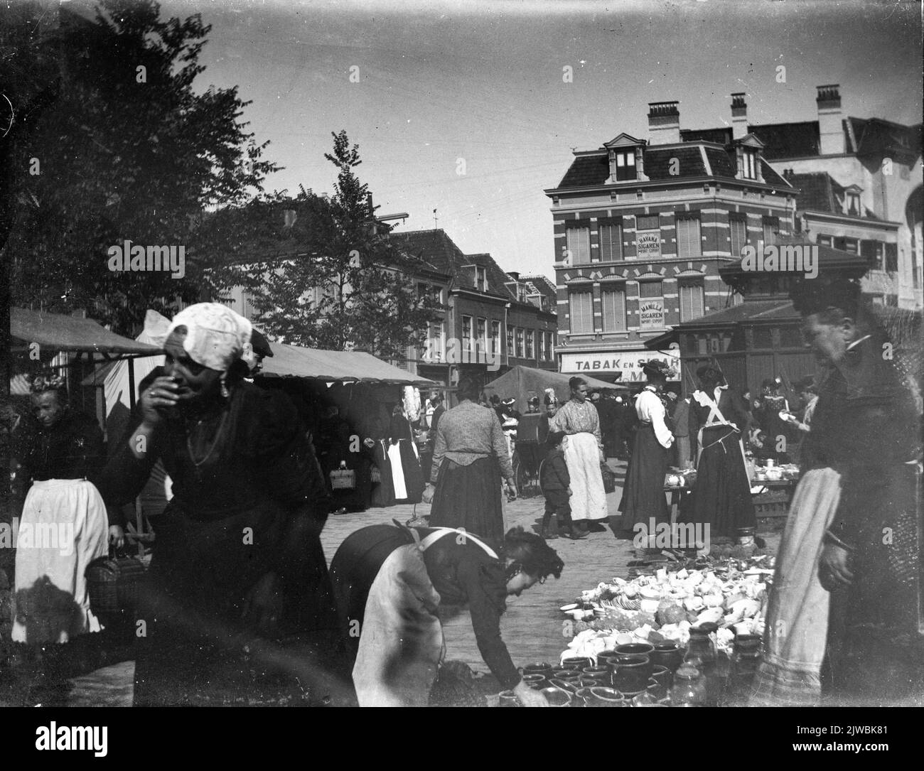 View of the market pressure on the Neude in Utrecht with a few houses ...