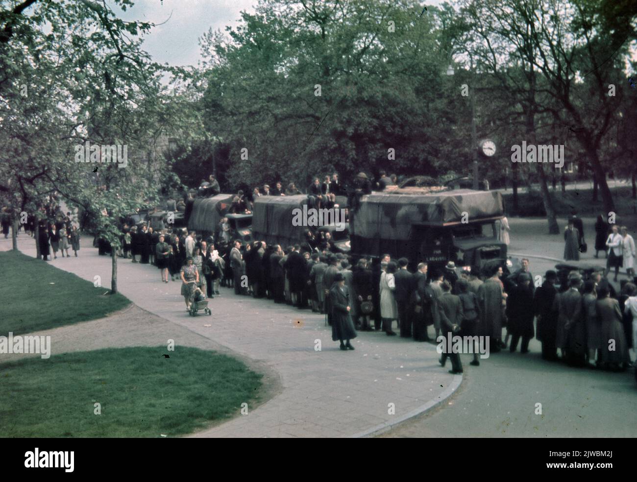 Image of, presumably, some allied trucks during a food transport under ...
