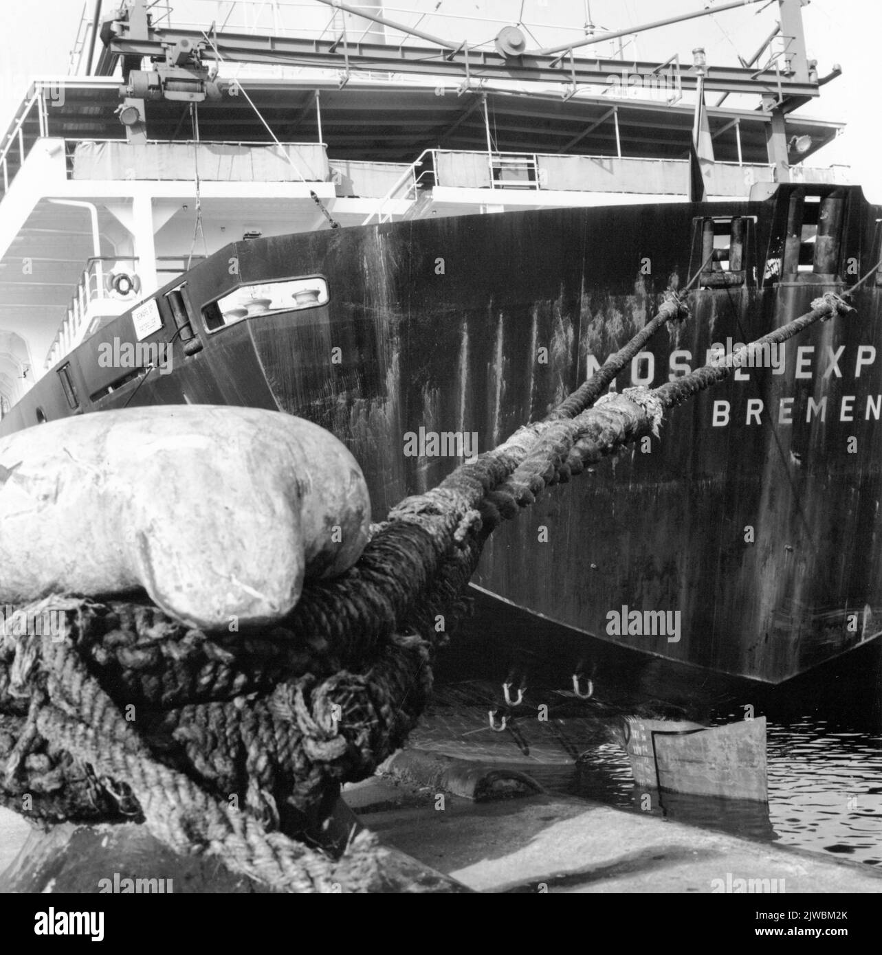 Container ship in the port of rotterdam Black and White Stock Photos ...