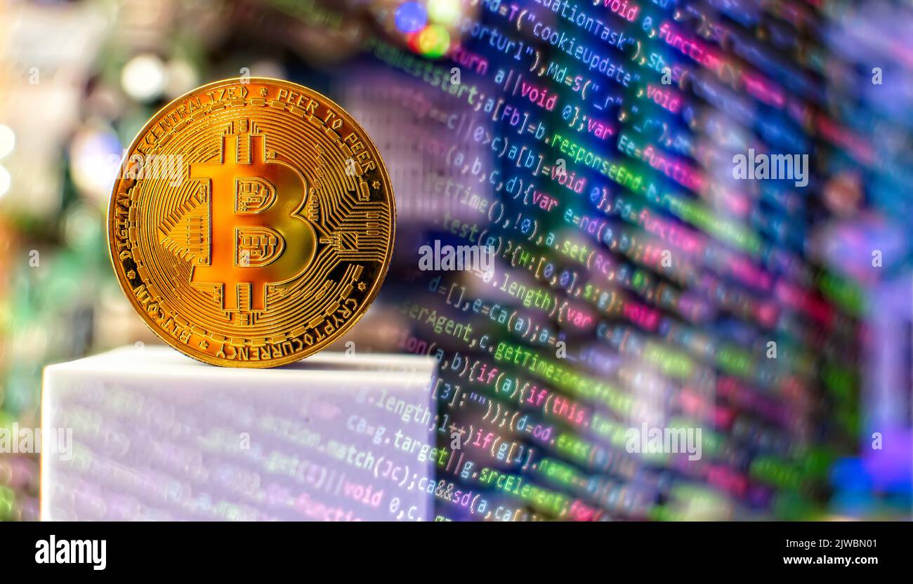Blockchain technology bitcoin mining concept. Bitcoin golden coin on ...