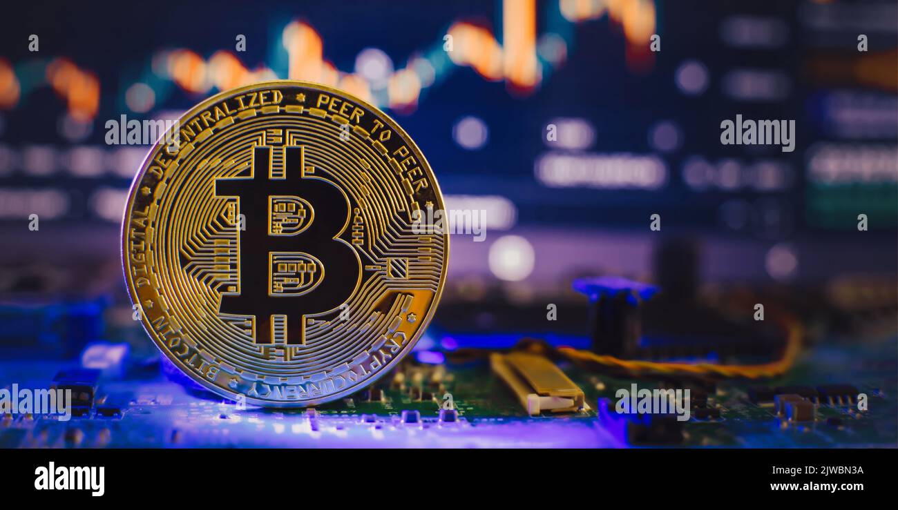 Blockchain technology bitcoin mining concept. Bitcoin golden coin on ...