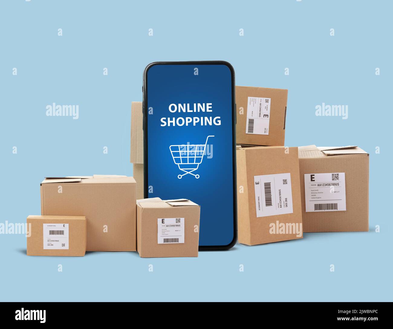 Big smartphone with text ONLINE SHOPPING on screen and many parcels on ...