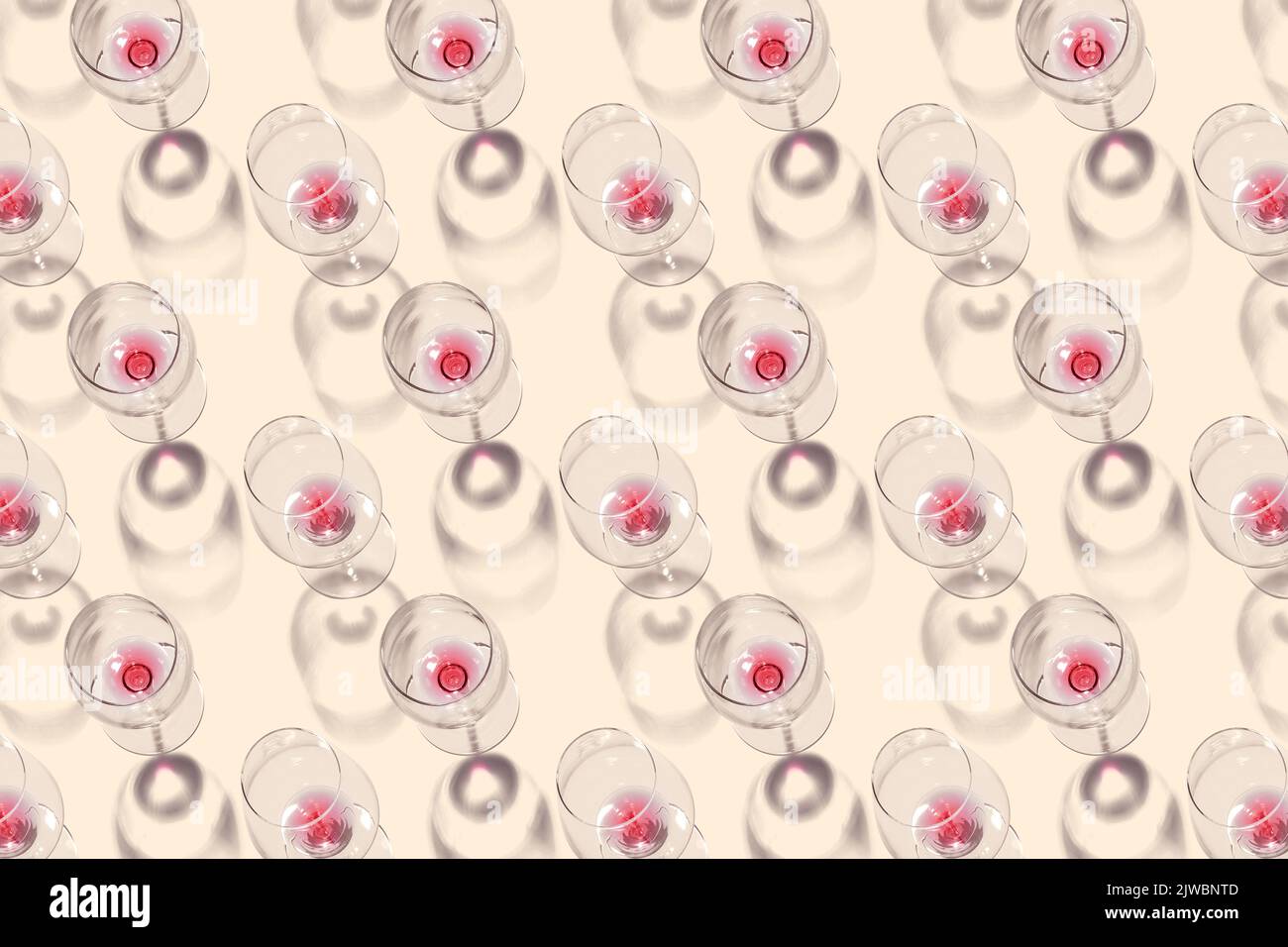 Many wineglasses on beige background. Pattern for design Stock Photo ...