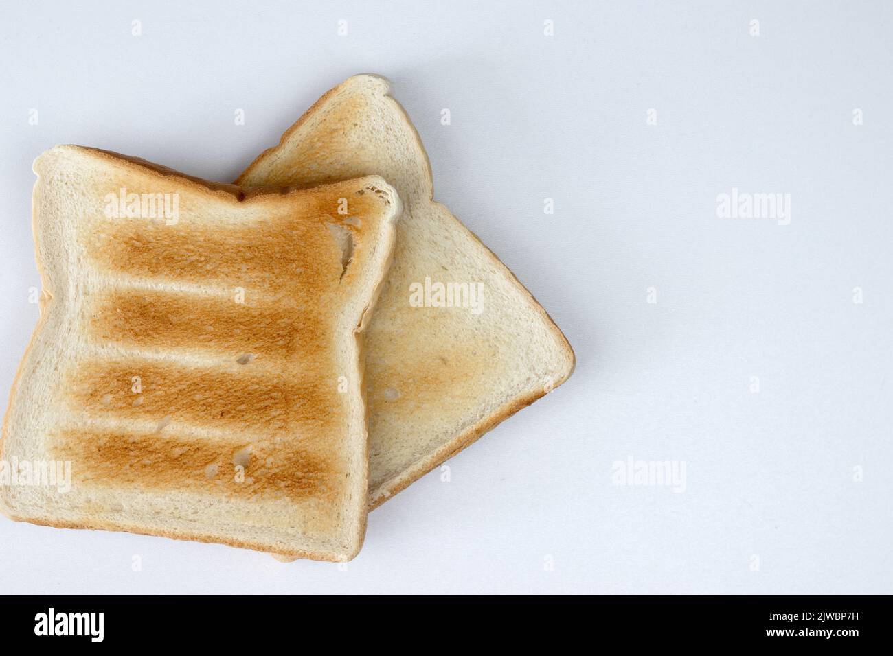 The close-up view of toast breads isolated on the white background ...