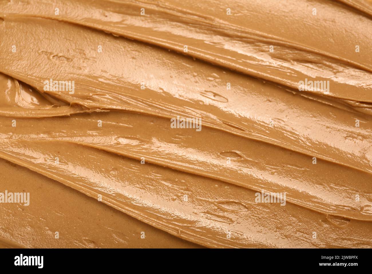 Texture of nut butter as background, closeup Stock Photo - Alamy