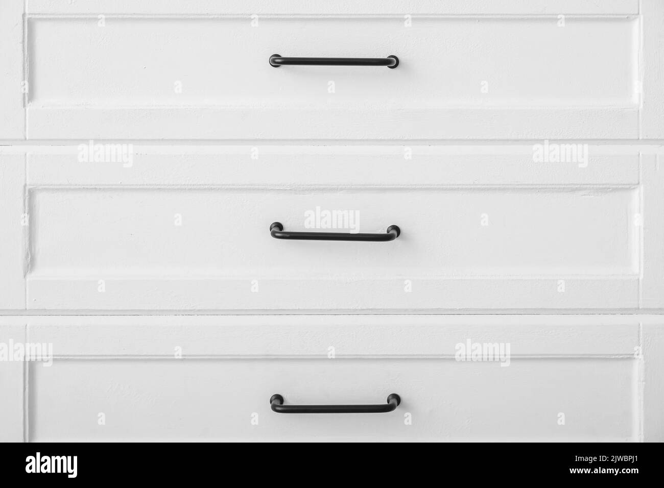 White counter with drawers in kitchen, closeup Stock Photo - Alamy