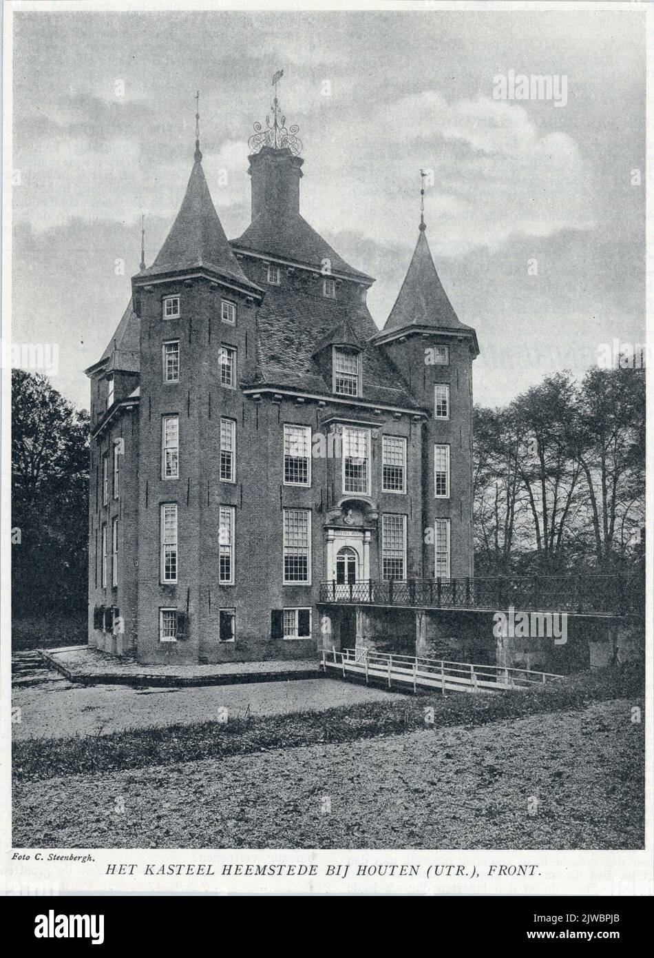 View of the facade and access bridge of the Heemstede castle in Houten ...