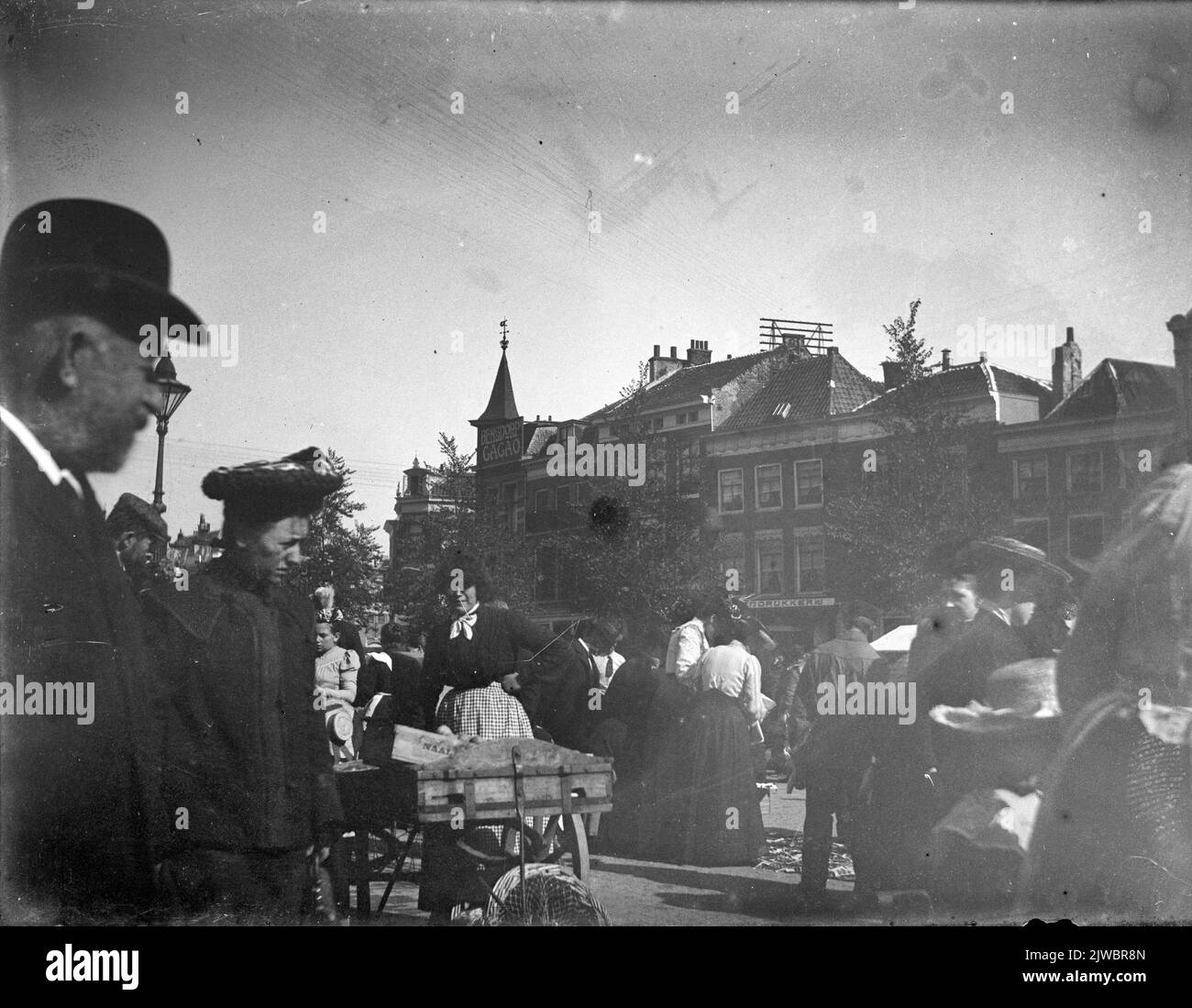 View of the market pressure on the Neude in Utrecht with a few houses ...