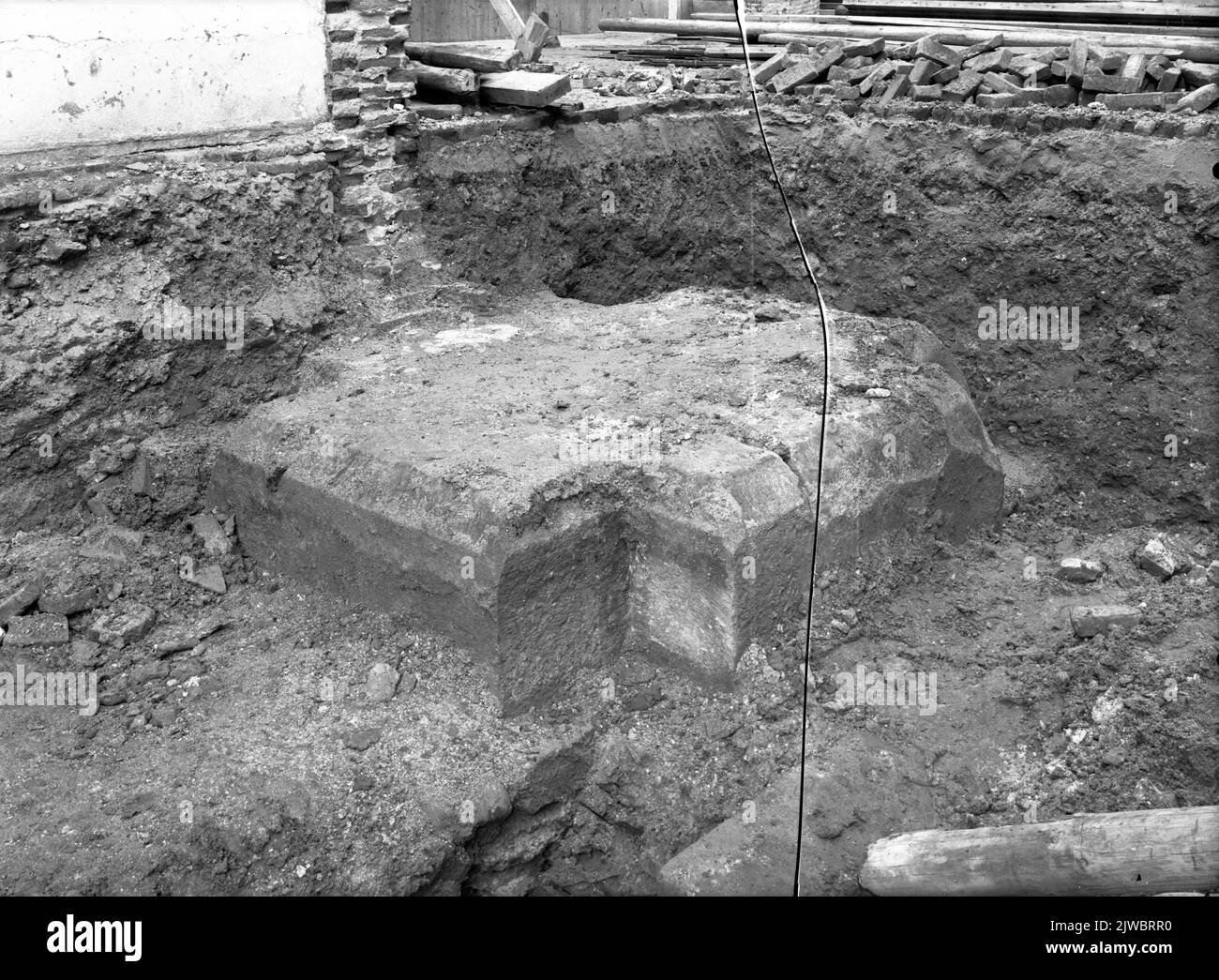 Image of a foundation exposed with an excavation at an unknown location ...