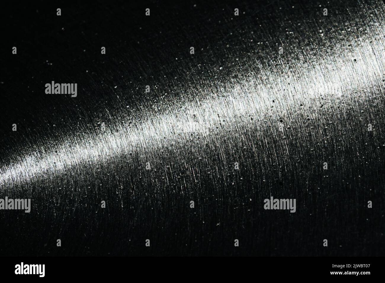 Metal part of a wheel scratched with disk brakes with thin white line ...