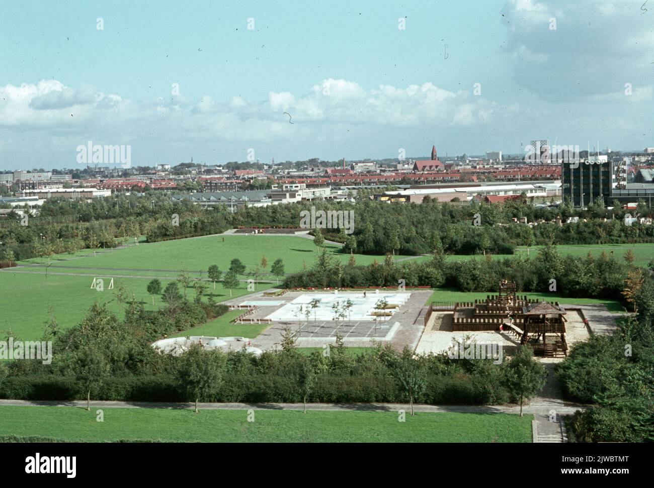 View of the play pond and the playground with climbing towers in the ...