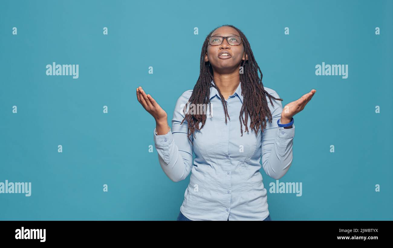 Female person begging for good luck and fortune, asking god for desire ...