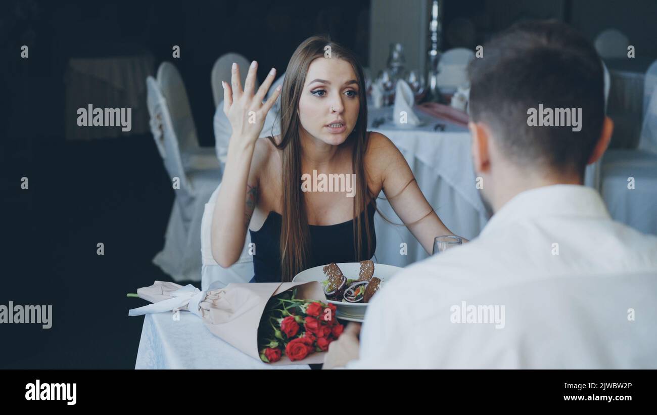 Couple dinner restaurant unhappy hi-res stock photography and images ...