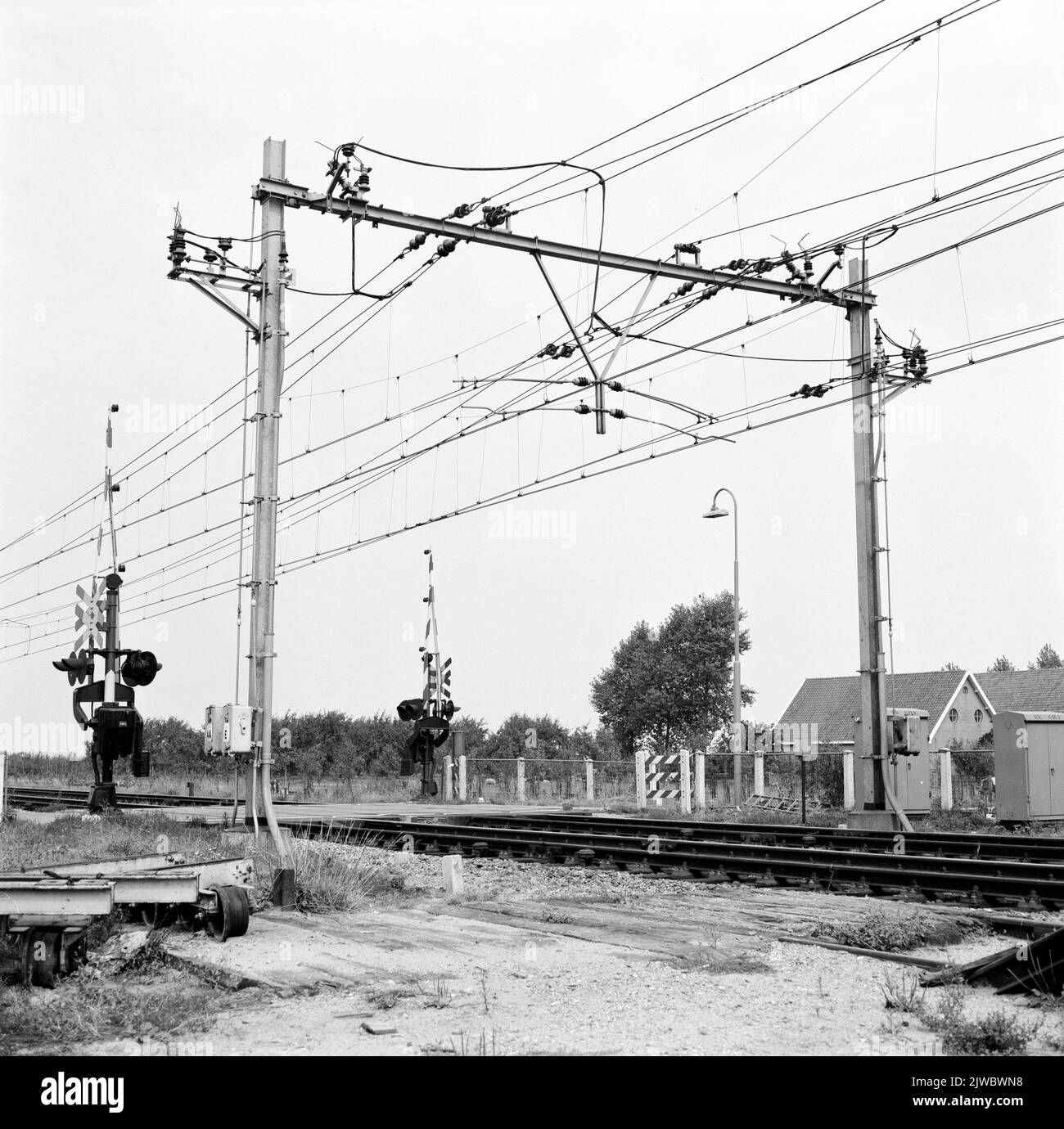 Image of an overhead pipe portal with switches on the railway line in ...