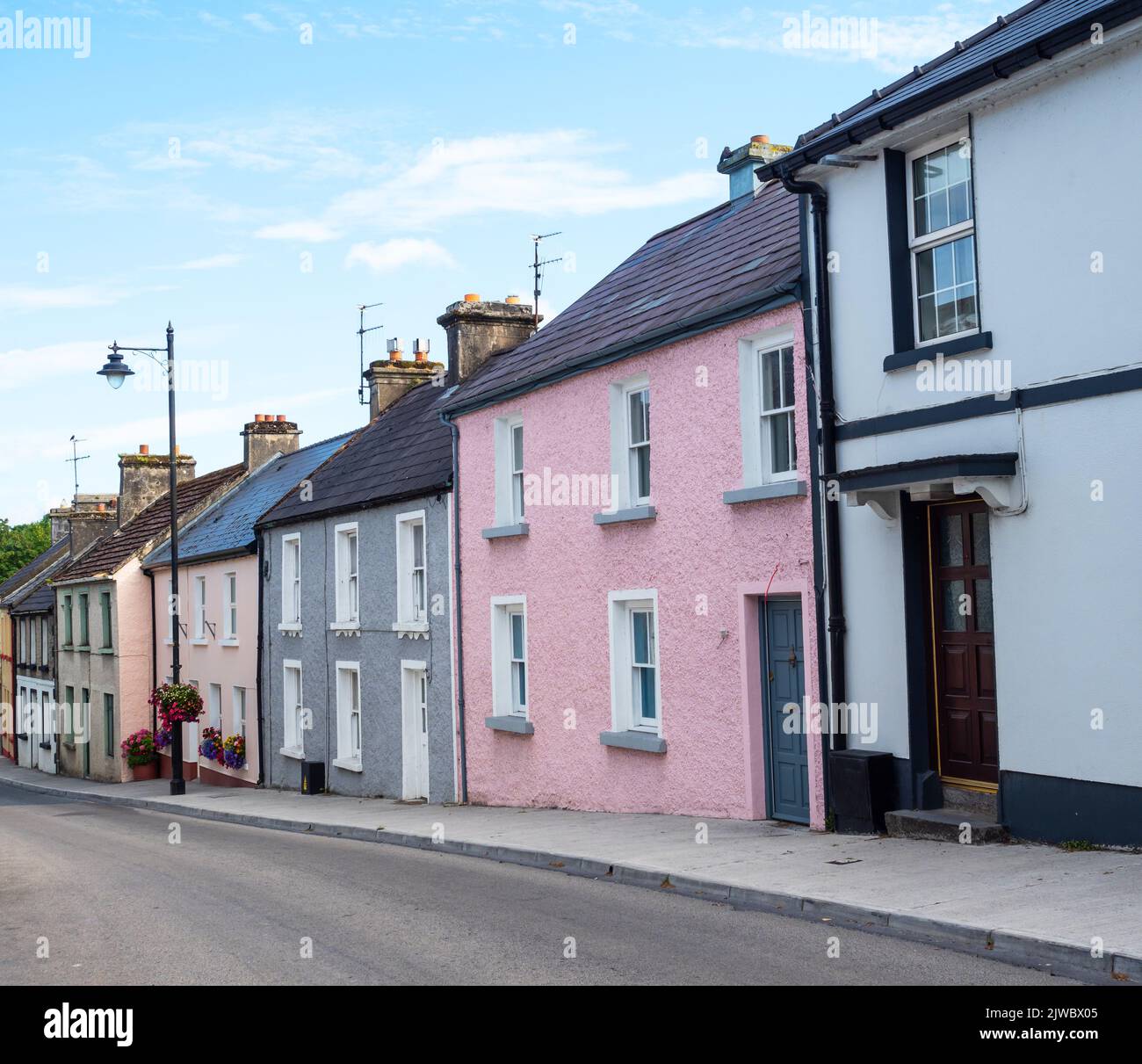 Traditional houses along Main Street in Cong, on the border of County ...