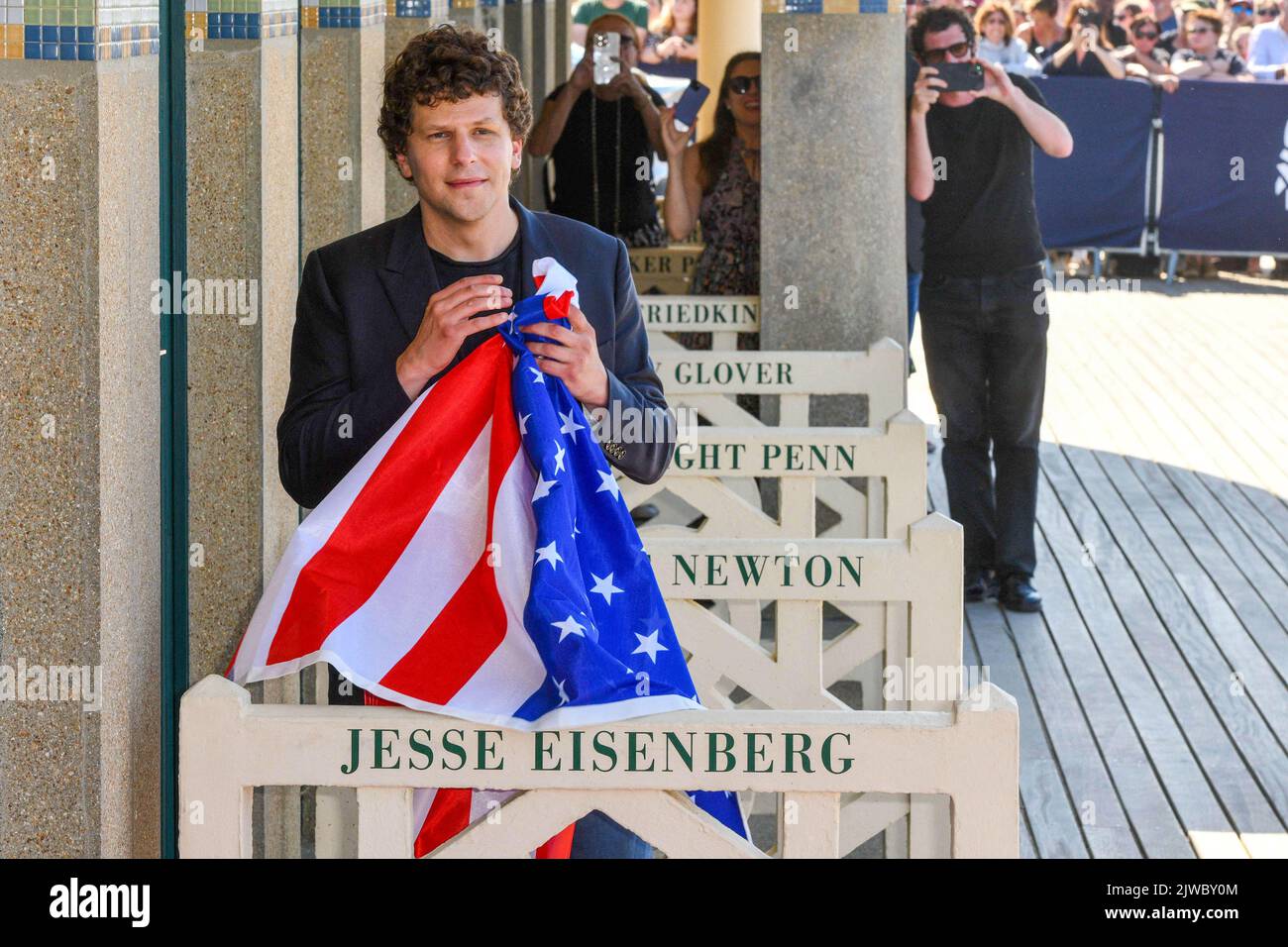 Jesse Eisenberg poses during the unveiling of his dedicated beach ...