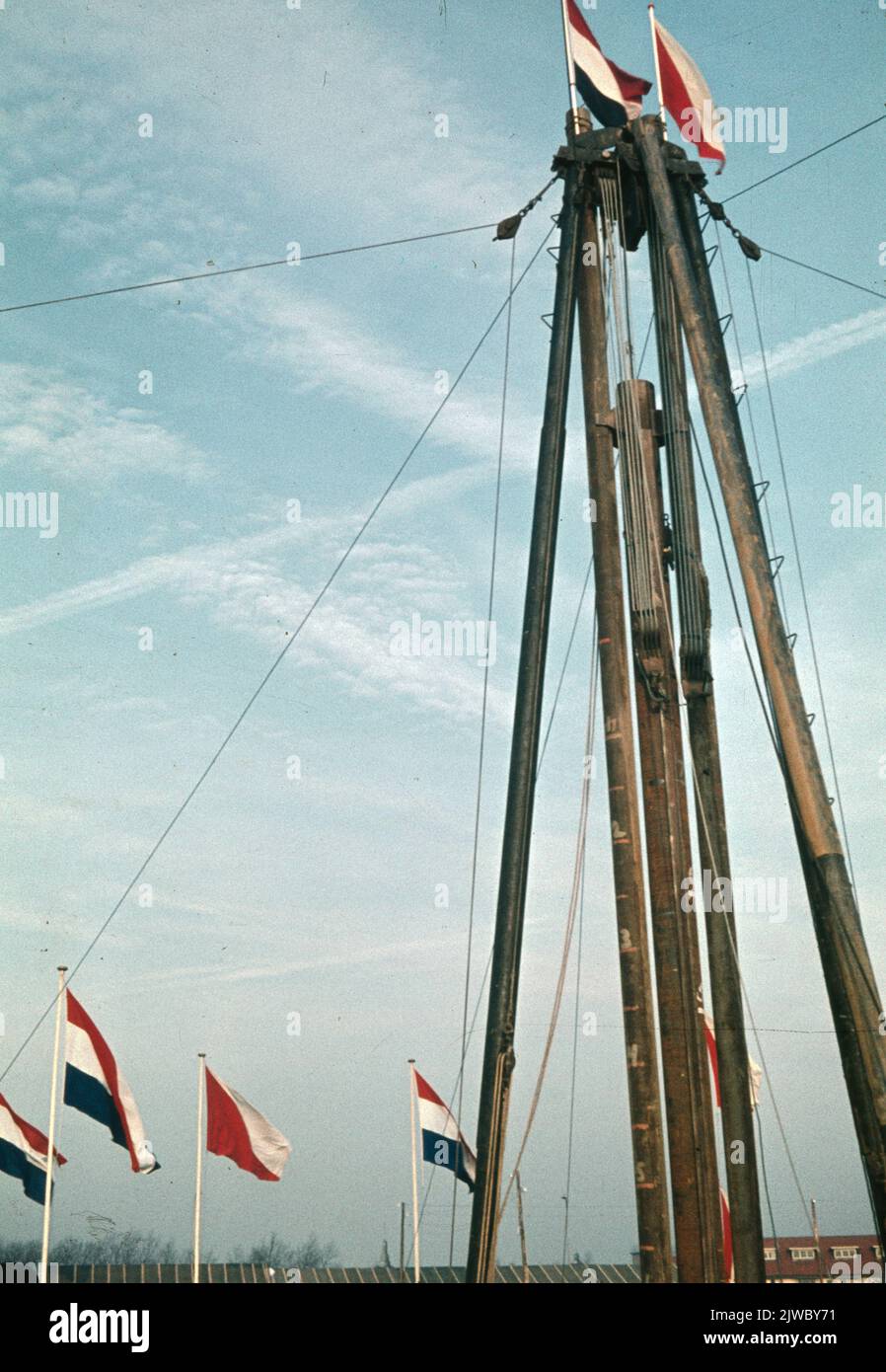 Image of the pile-driving installation and the flags when beating the ...
