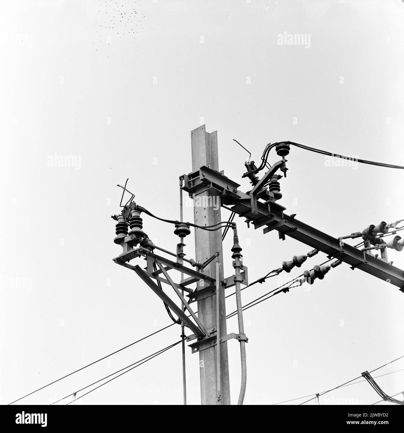 Detail of the overhead line of the railway line at Houten: switch Stock ...