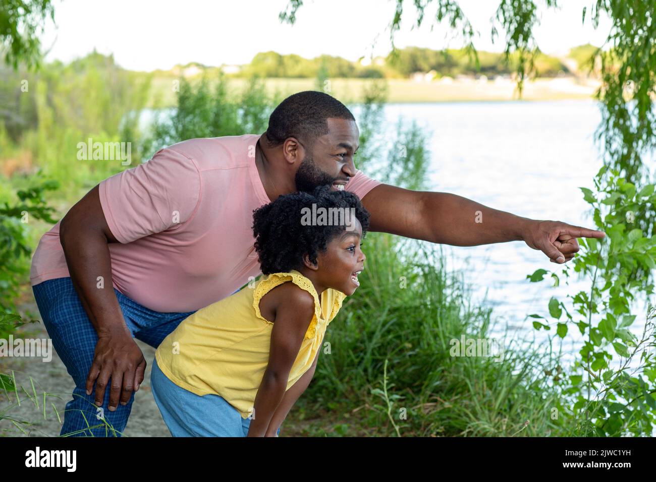 Happy father and his beautiful daughter smiling Stock Photo - Alamy