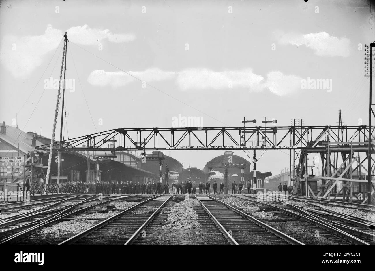 View of placing the iron auxiliary foot bridge over the tracks at ...