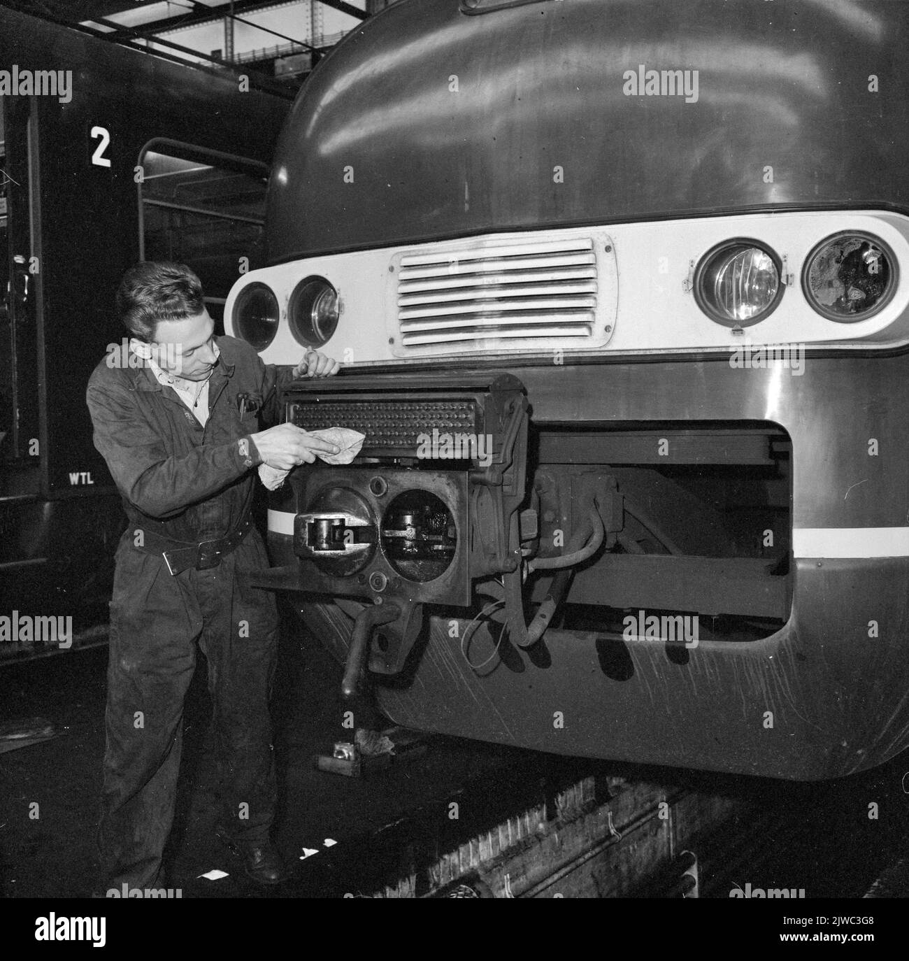 Image of a maintenance engineer during work on the automatic coupling ...