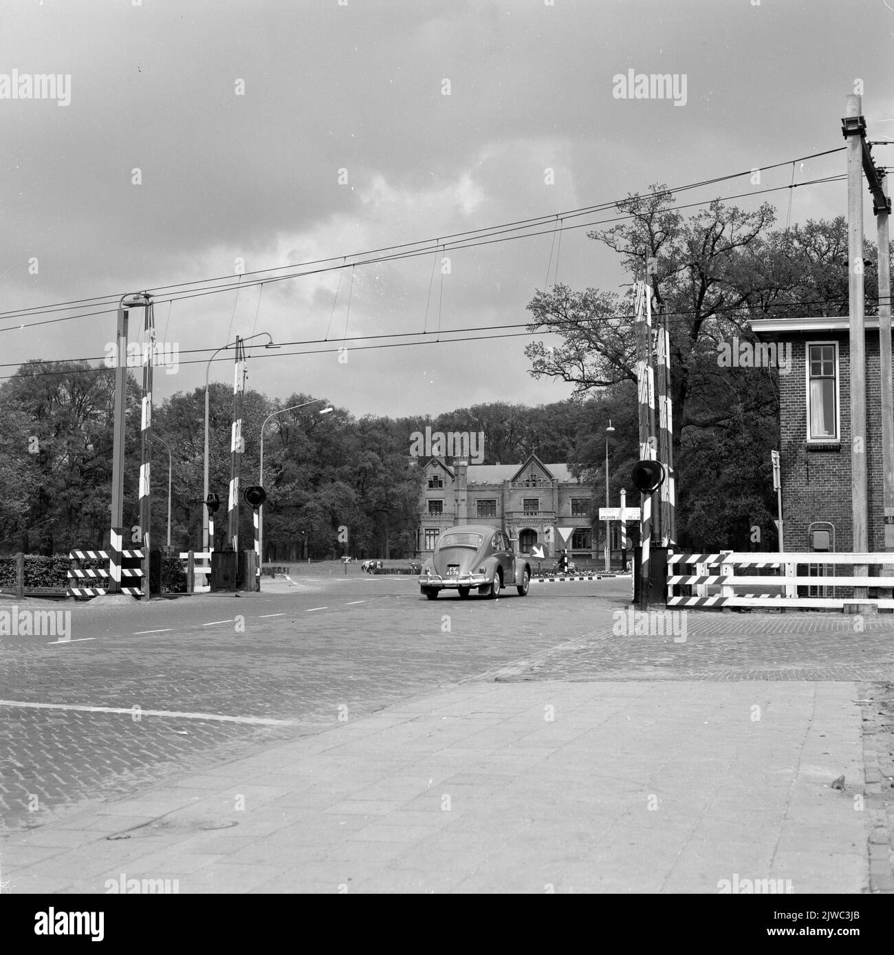 View of the railway crossing on the Spoorstraat in Barneveld, with the ...