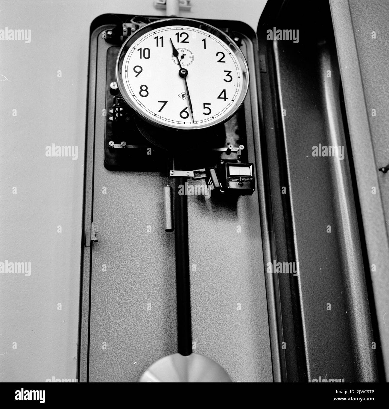 Central clock mechanism hi-res stock photography and images - Alamy