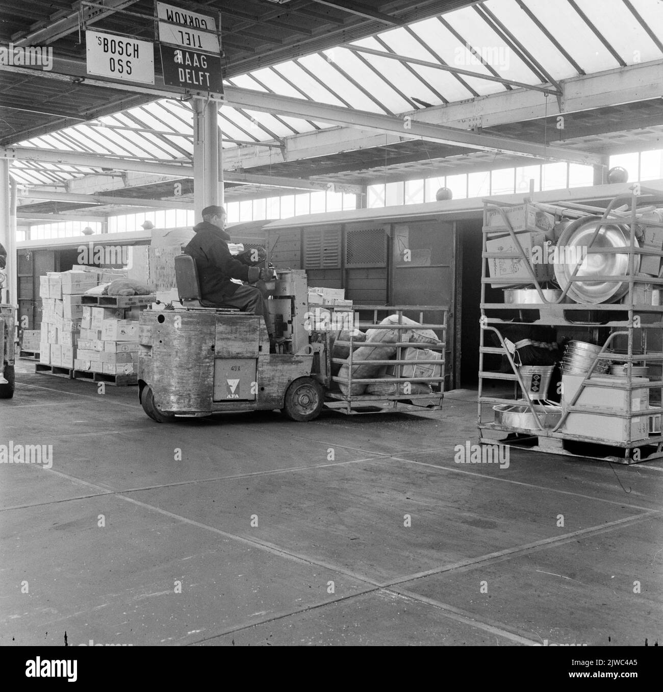 Image of loading a freight wagon with general cargo using a forklift ...